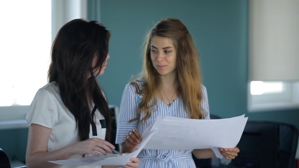 Young Female Is Asking Boss For Approval Of Documents., Stock Footage