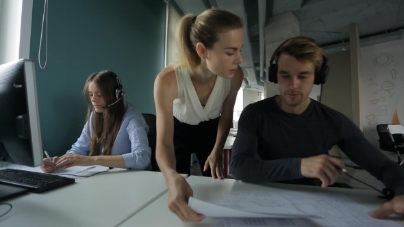 Young Female Boss Is Controlling Work Of Subordinates., Stock Footage