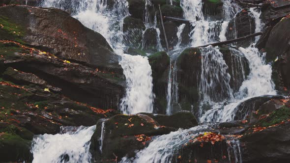 Waterfall Falling Down Mountain Slope in Autumn Forest, Stock Footage
