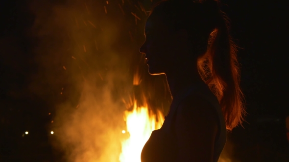 Profile Of a Woman On a Background Of a Fire, Stock Footage | VideoHive
