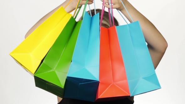 Beautiful Girl With Colorful Packages. Shopping. White, Stock Footage