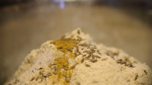 Strew a Flour Hill With Cumin By Turmeric, Stock Footage | VideoHive
