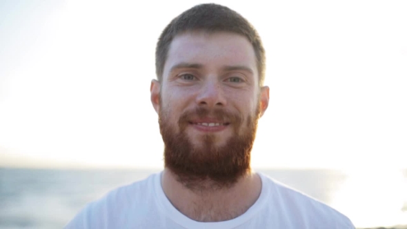 Face Of Happy Smiling Young Man On Beach 56, Stock Footage | VideoHive