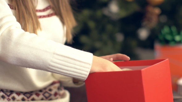 Beautiful Smiling Girl Open Christmas Gift, Stock Footage | VideoHive
