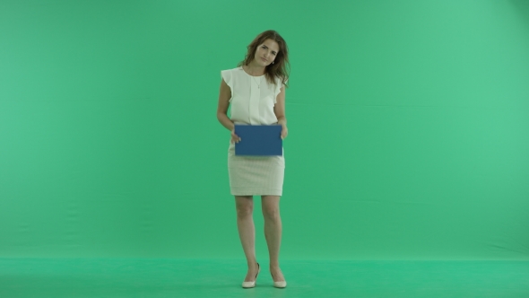Woman Showing a Blue Screen On a Green Background, Stock Footage ...