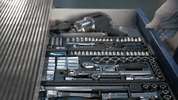 Mechanic Open Blue Metal Box With Different Tools For Car Repair At ...