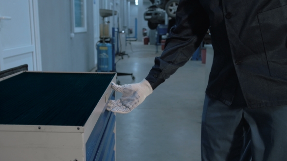 Mechanic Open Blue Metal Box With Different Tools For Car Repair At ...