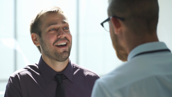 Two Men Talking In The Lobby Of The Office, Stock Footage | VideoHive