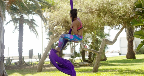 Female Acrobat Working Outdoors On Silk Ribbons, Stock Footage | VideoHive