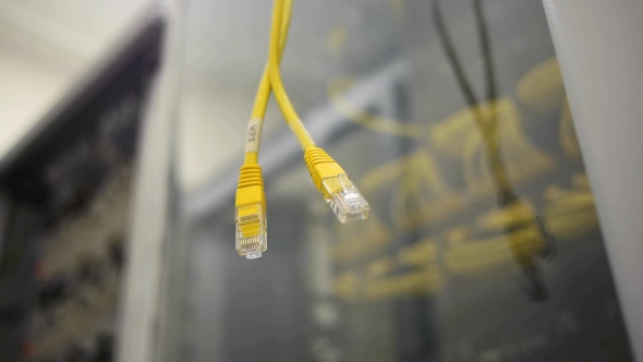 Two Yellow Ethernet Cable Hanging On The Server Rack, Stock Footage