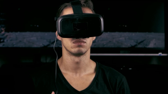 Man Put On VR-headset And Getting Experience In Using VR-headset ...