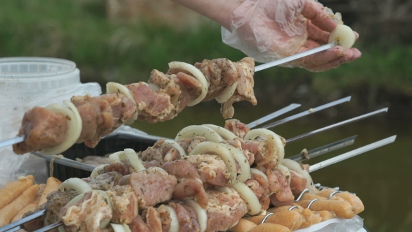 Hand Is Stringing Pieces Of Raw Meat On a Skewer, Stock Footage | VideoHive