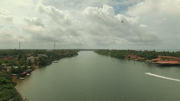 Helicopter Flying Over River Town, Stock Footage | VideoHive