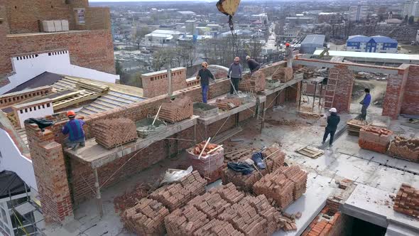 Construction Workers Working on a Building Site of New Residential ...