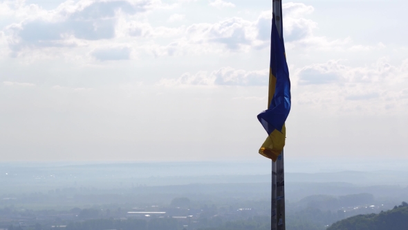 Ukrainian Flag Flying On Top Of The Beautiful Panorama Of The City ...