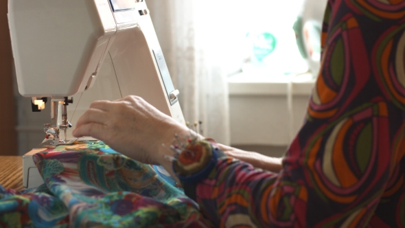 Woman's Hand Sewing On The Sewing Machine, Stock Footage | VideoHive
