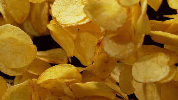 Super Slow Motion Shot of Potato Chips Flies After Being Exploded ...
