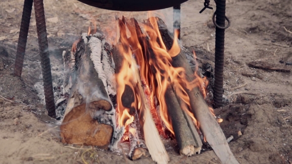 Campfire Burning Under a Cauldron, Stock Footage | VideoHive