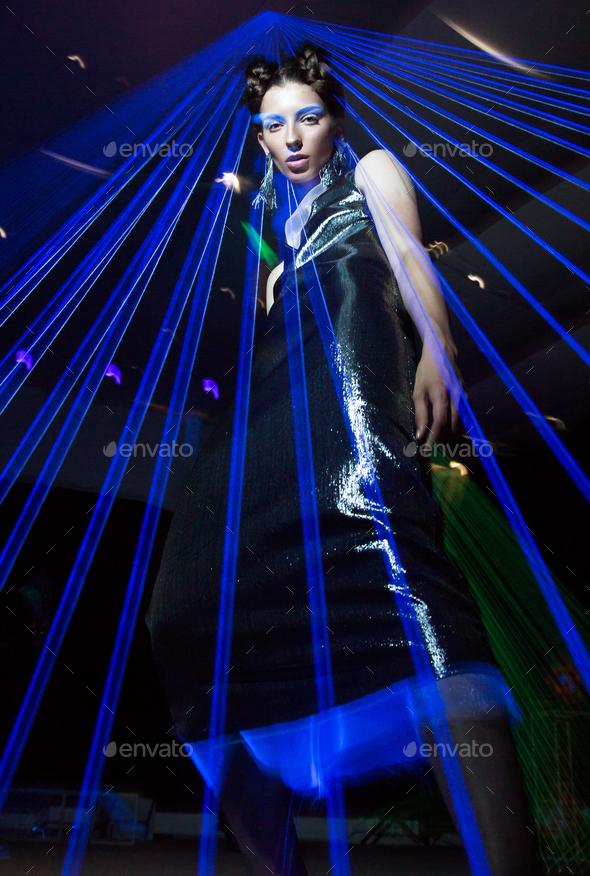 Fashion model in fashionable clothes in ultraviolet light Stock Photo ...
