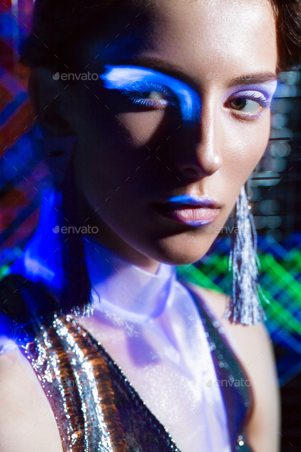 Fashion model in fashionable clothes in ultraviolet light Stock Photo ...