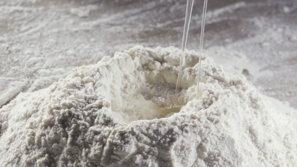 Egg Dropping Into Flour, Stock Footage | VideoHive