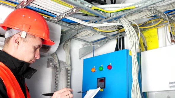 Engineer At The Electronic Board, Working, Stock Footage | VideoHive