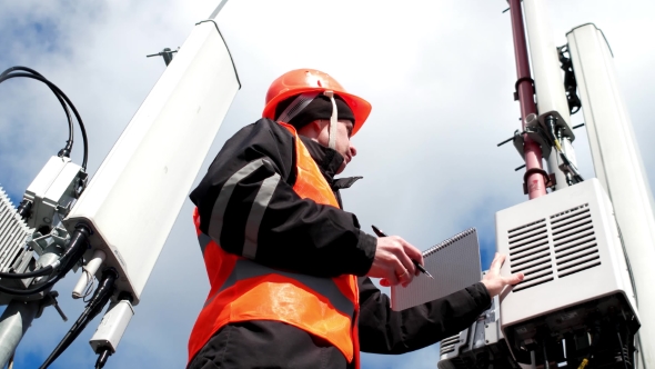 The Engineer Checks The Equipment Communication Tower, Stock Footage