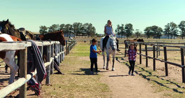Kids riding a horse in the ranch 4k, Stock Footage | VideoHive