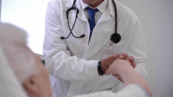 Caring Doctor Holding Hand of Patient, Stock Footage | VideoHive