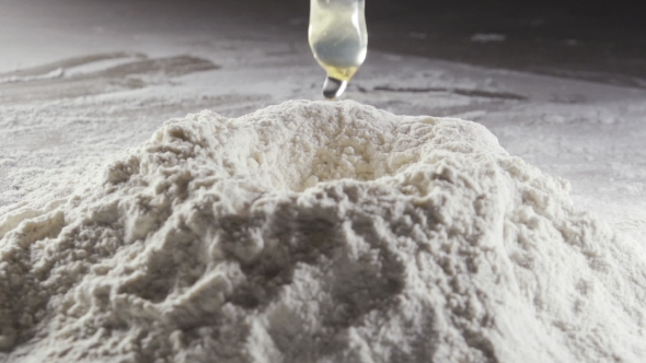Egg Dropping Into Flour, Stock Footage | VideoHive