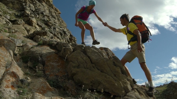 Couple Climbing Mountain Range, Stock Footage | VideoHive