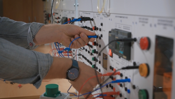 Intern In Lab Connect The Cables To The Device, Stock Footage | VideoHive