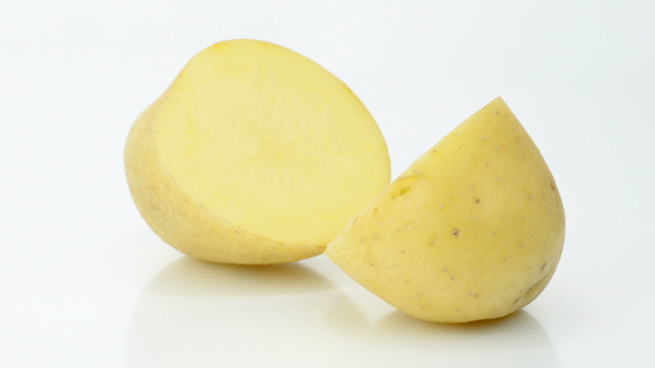 Potato Halved on White Background, Stock Footage | VideoHive