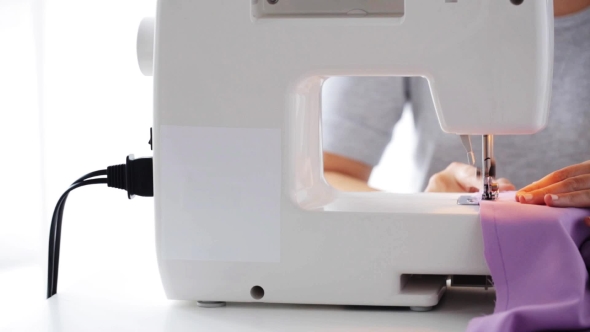 Tailor Woman With Sewing Machine Stitching Fabric 7, Stock Footage