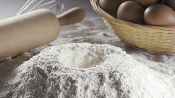 Egg Dropping Into Flour, Stock Footage | VideoHive