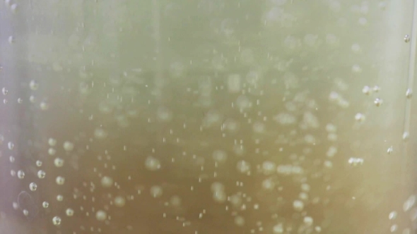 Fizzy Drink Or Bubbles Floating Up In Water, Stock Footage | VideoHive