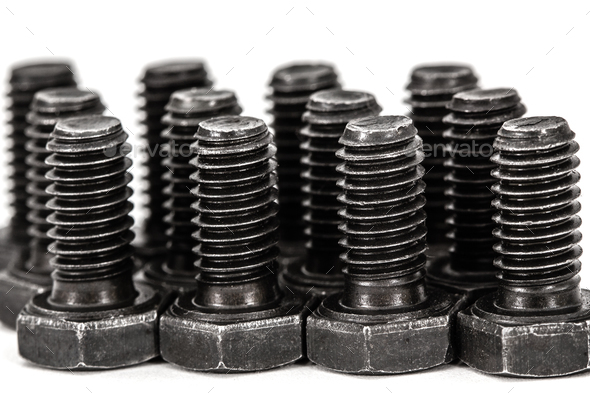 Hardened screws, isolated on white background Stock Photo by kostiuchenko
