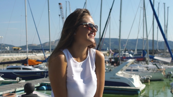 Beautiful Girl Laughing In On The Background Of Yachts, Stock Footage