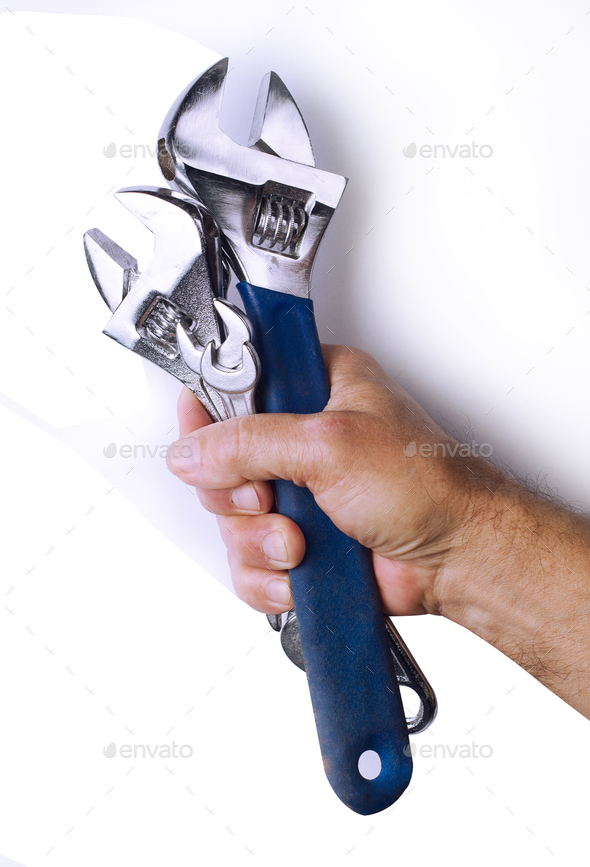Strong hand holding tools on white background Stock Photo by macondoso