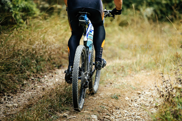closeup of rear wheel sports mountain bike Stock Photo by realsportsphotos