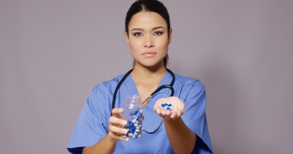 Beautiful Latina Female Doctor With Bunch Of Pills, Stock Footage ...