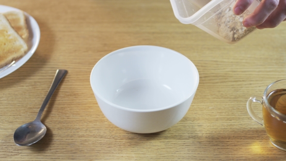 Putting Muesli Into a Bowl, Stock Footage | VideoHive