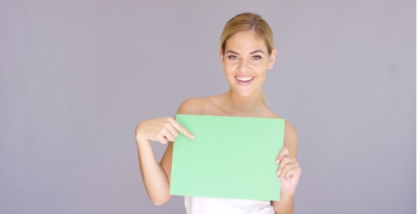 Attractive Blond Woman Holding a Blank Green Sign, Stock Footage ...