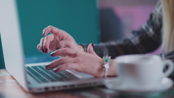 of Female Hands Typing on a Laptop Keyboard., Stock Footage | VideoHive