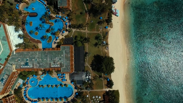 Aerial: Swimming Pool on the Beach, Stock Footage | VideoHive