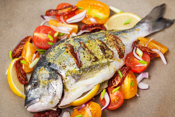 Raw whole sea bream fish and vegetables ingredients Stock Photo by ...