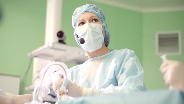 Doctor Performs Endoscopic Surgery Removing a Brain Tumor, Stock Footage