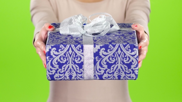Box Packed in Festive Paper with a Bow, Stock Footage | VideoHive