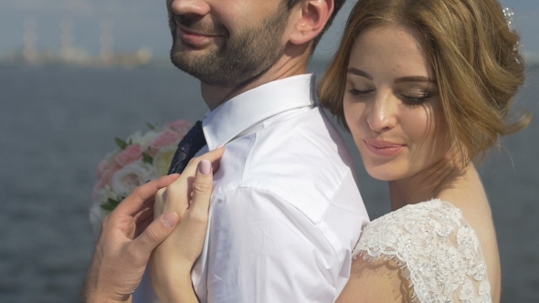The Bride Fondly Embraces the Groom, Stock Footage | VideoHive