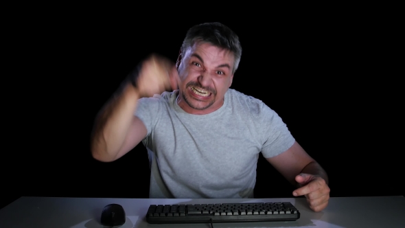 Guy in a Anger Shows Someone in a Computer Monitor, Stock Footage ...